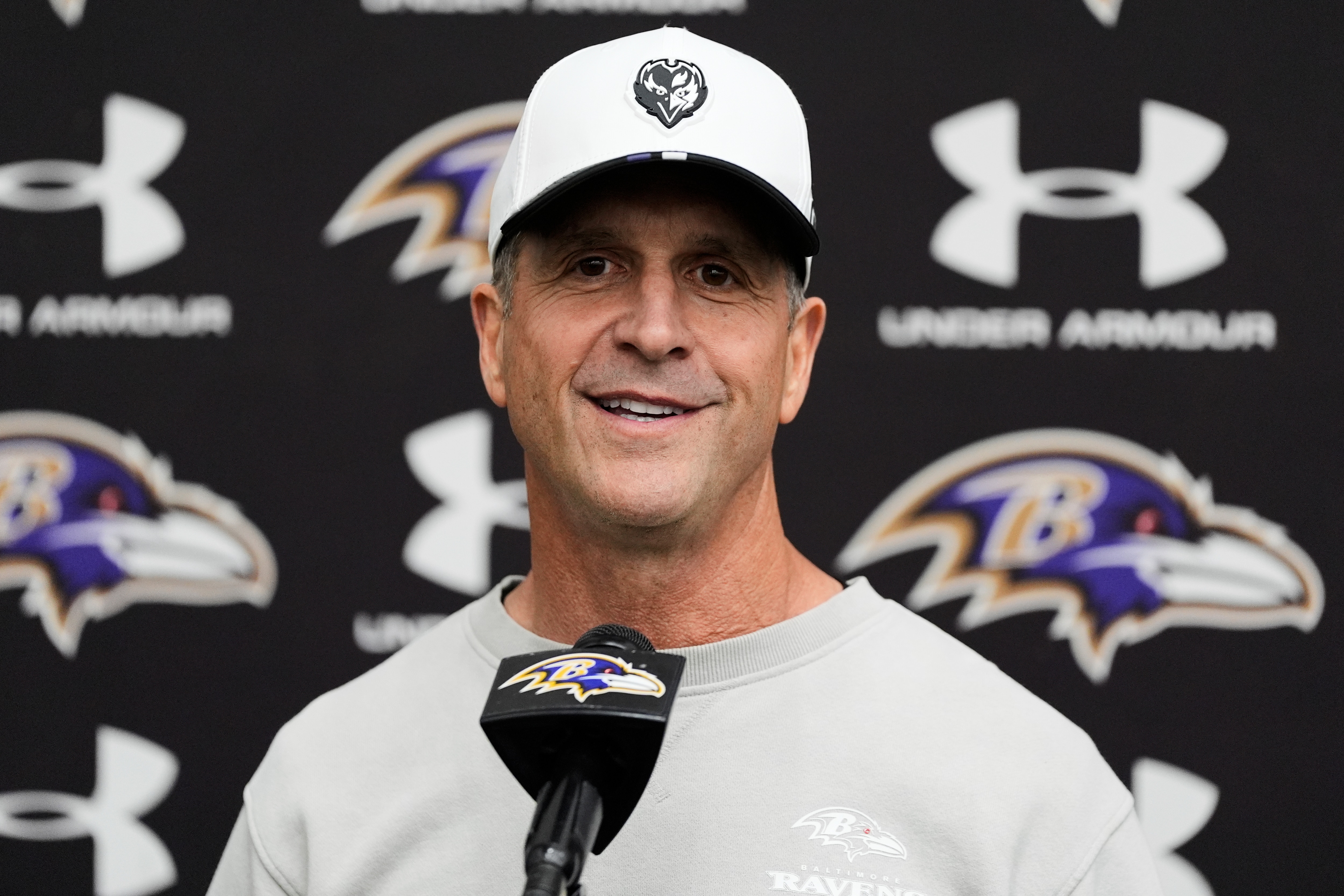Ravens' Harbaugh Reacts to Aaron Rodgers' Steelers Contract, Calls Him ...