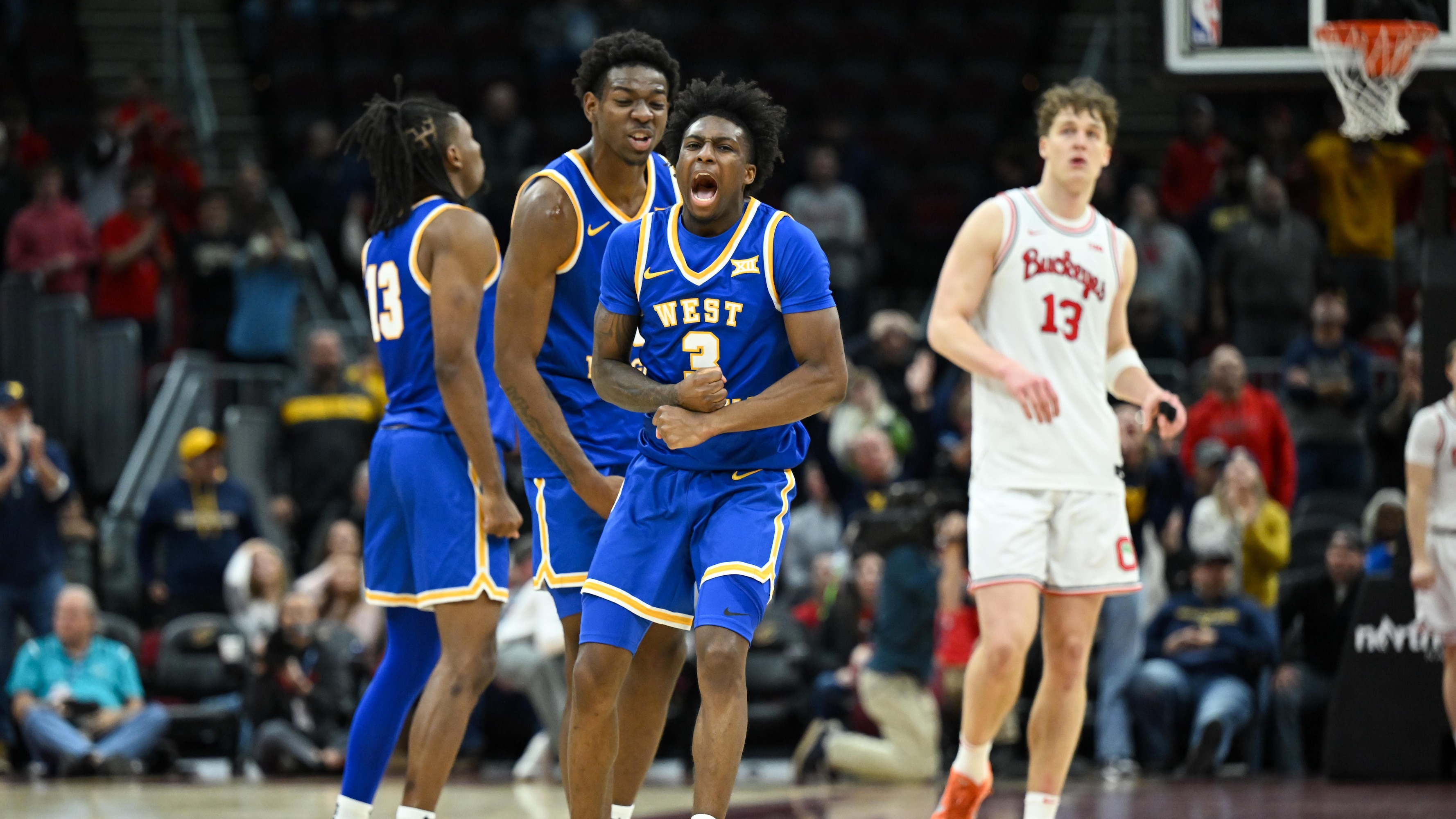 WVU Reveals Throwback Basketball Uniforms in Video, Photos Ahead of ...